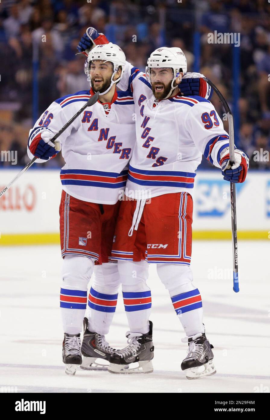 New York Rangers defenseman Keith Yandle, right, celebrates his goal ...