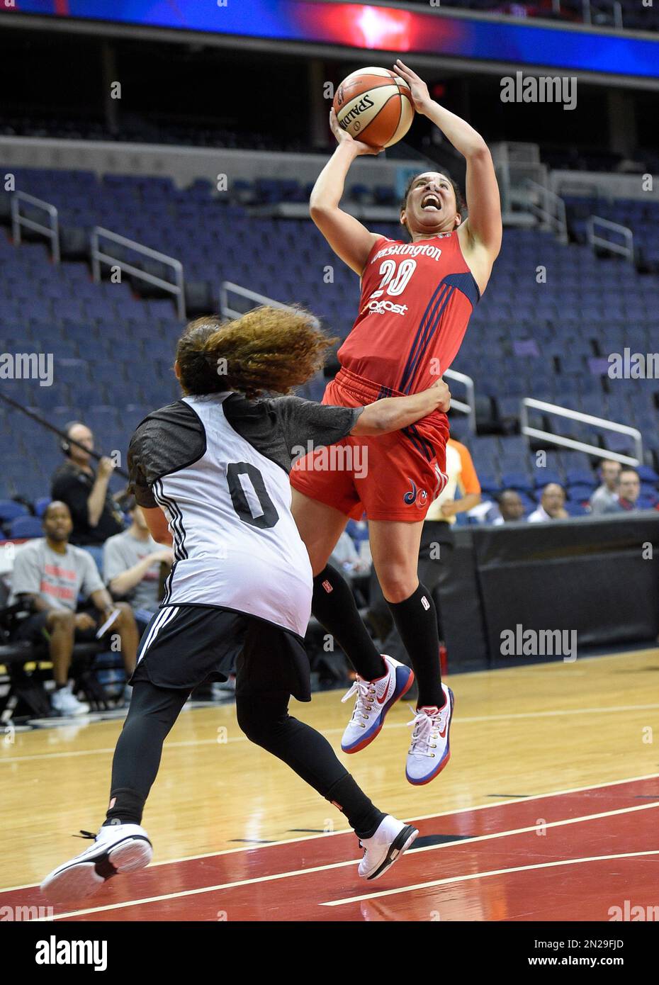 Washington Mystics Kara Lawson (20) is fouled by Minnesota Lynx ...