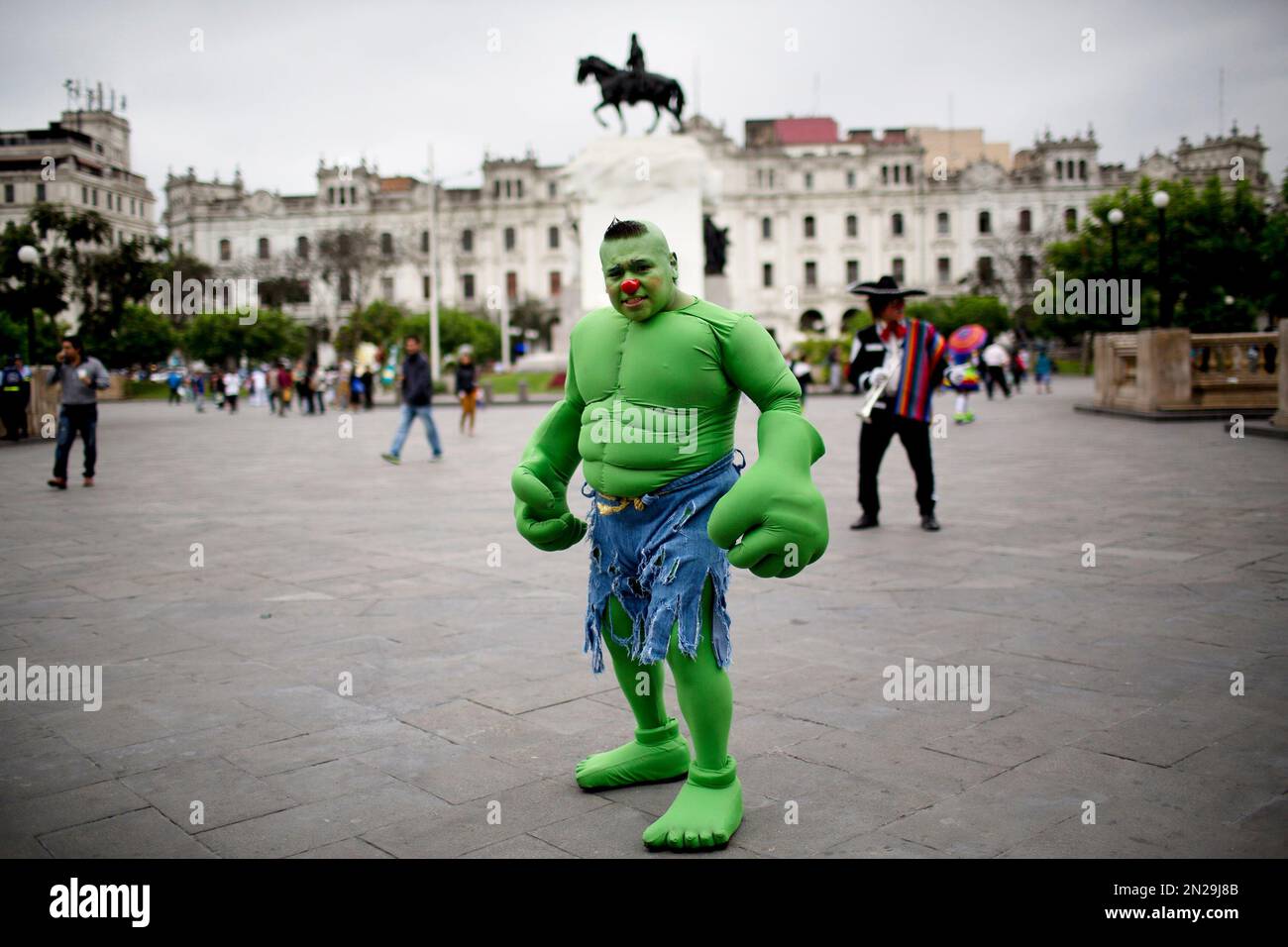 A clown acting as Hulk poses for the picture in San Martin square ...