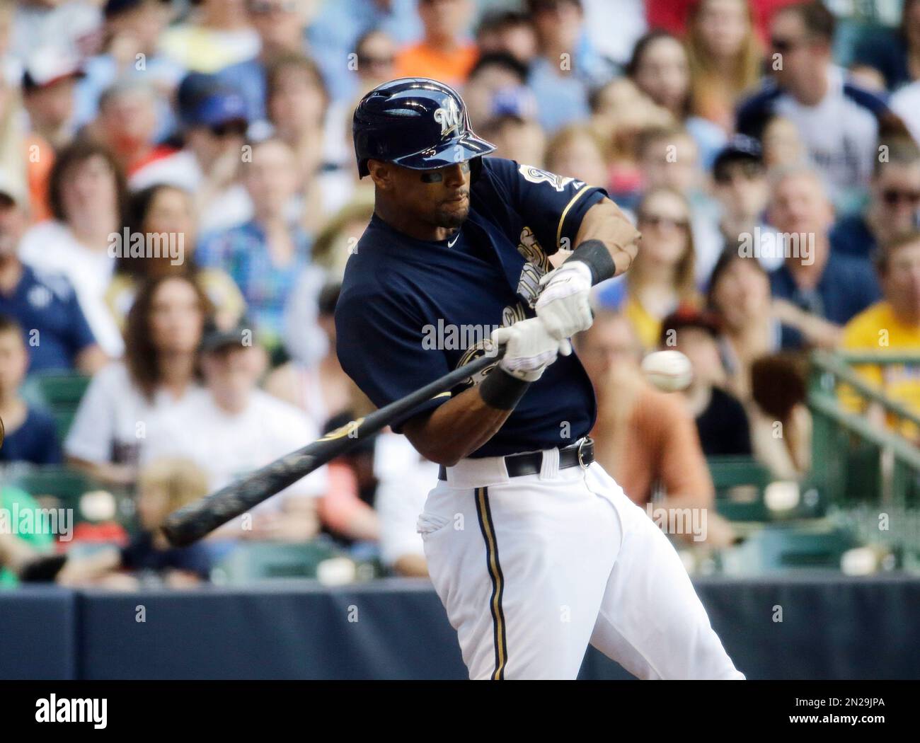 Milwaukee Brewers' Khris Davis hits during the fifth inning of a ...