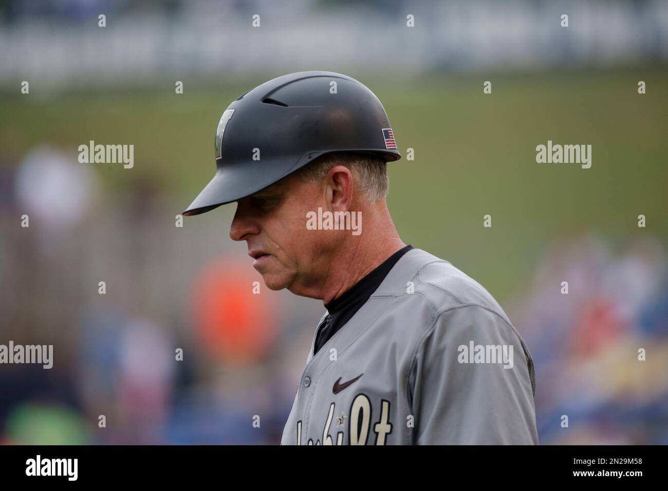 Vanderbilt head coach Tim Corbin walks near third base during the first ...