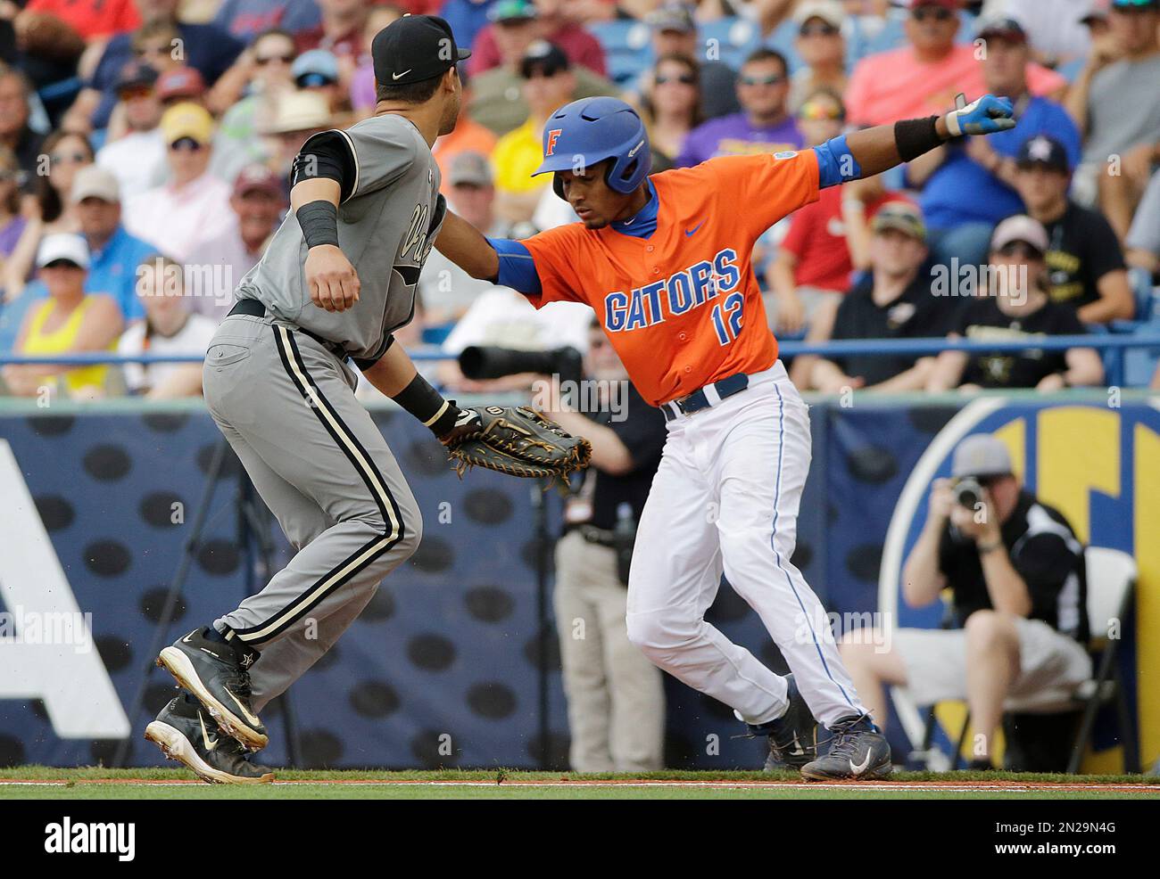 Vanderbilt's Zander Wiel, left, tags out Florida's Richie Martin during ...