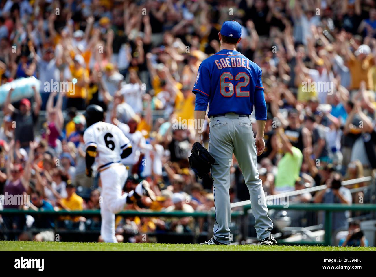 Pittsburgh Pirates' Starling Marte (6) rounds first base ater hitting a ...