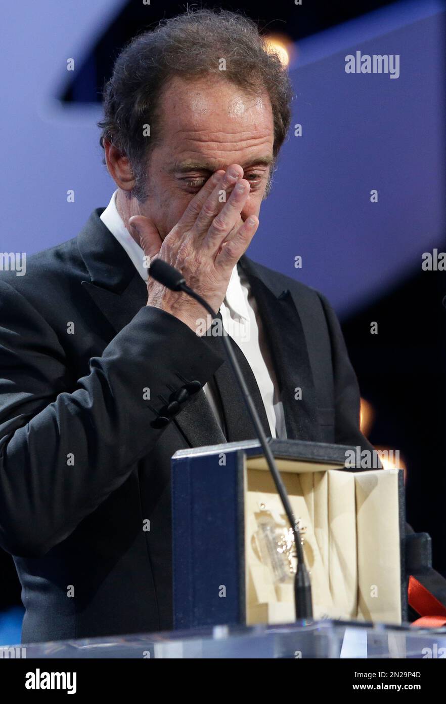 Actor Vincent Lindon reacts as he receives the Best Actor award for the ...