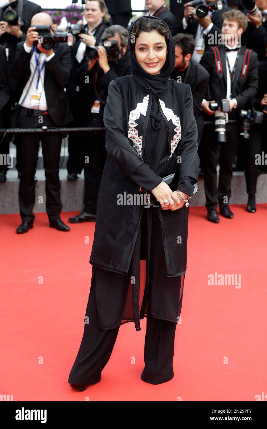 Actress Sarah Bayat poses for photographers upon arrival for the awards ...