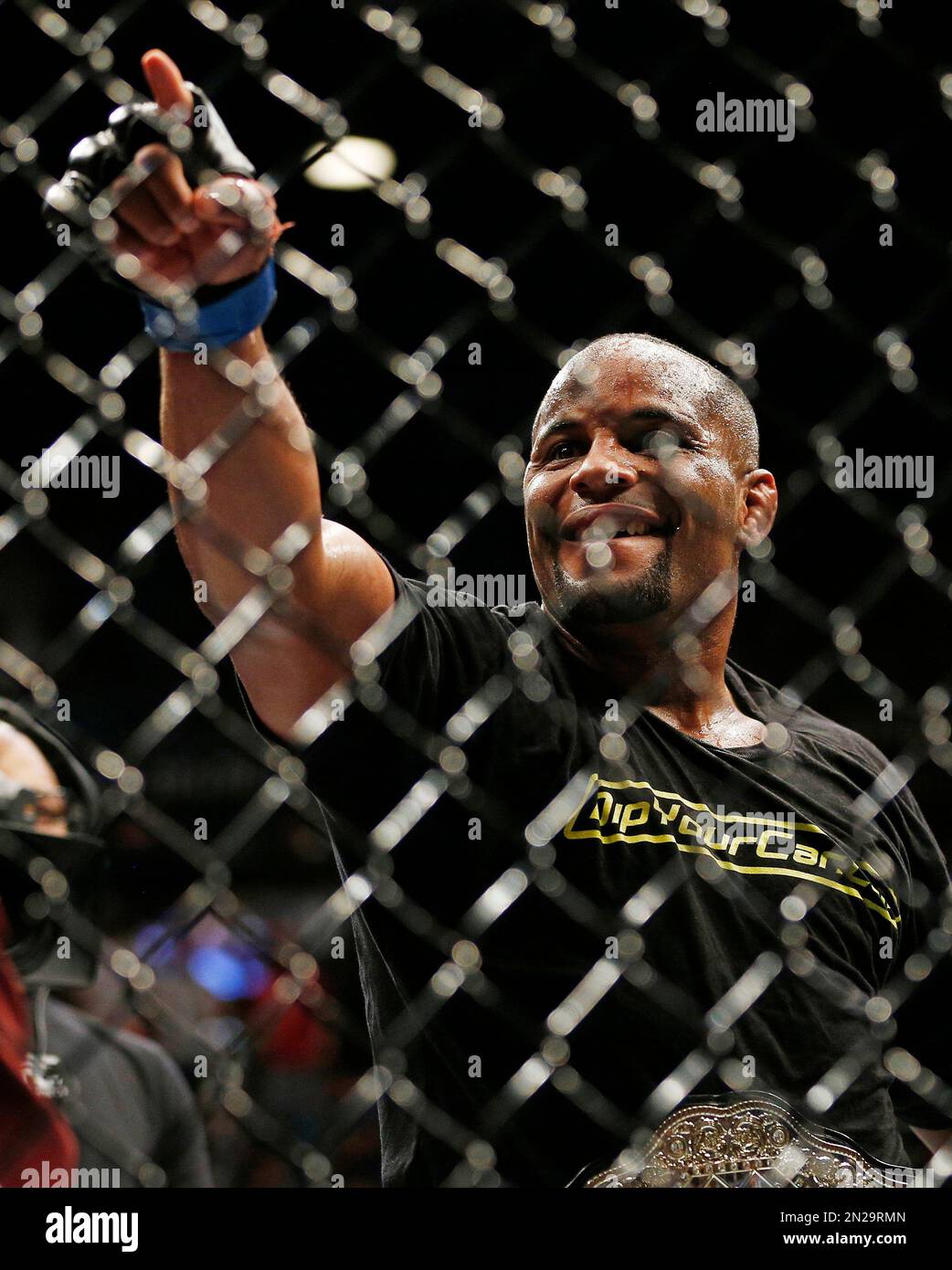 Daniel Cormier celebrates after defeating Anthony Johnson in their ...