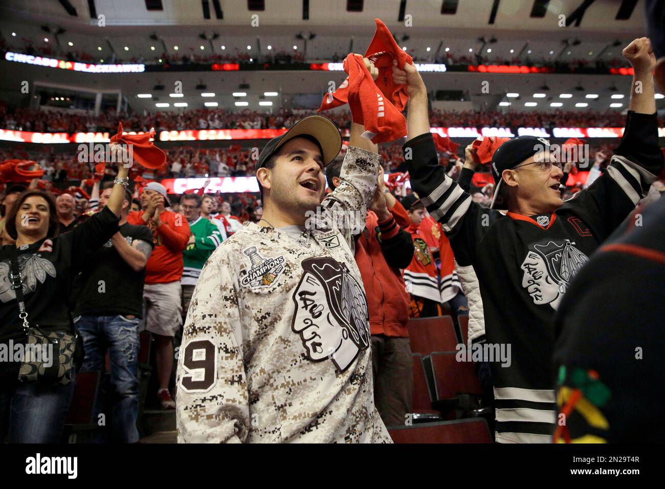 Chicago Blackhawks fans cheer during the first period in Game 4 of the ...