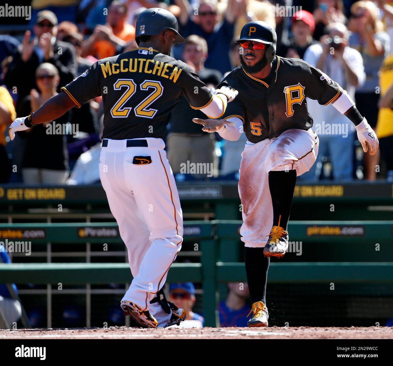 Pittsburgh Pirates' Andrew McCutchen (22) celebrates with Josh Harrison ...