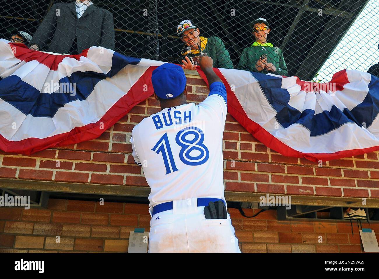 Former Toronto Blue Jays player Homer Bush greets fans during the Hall ...