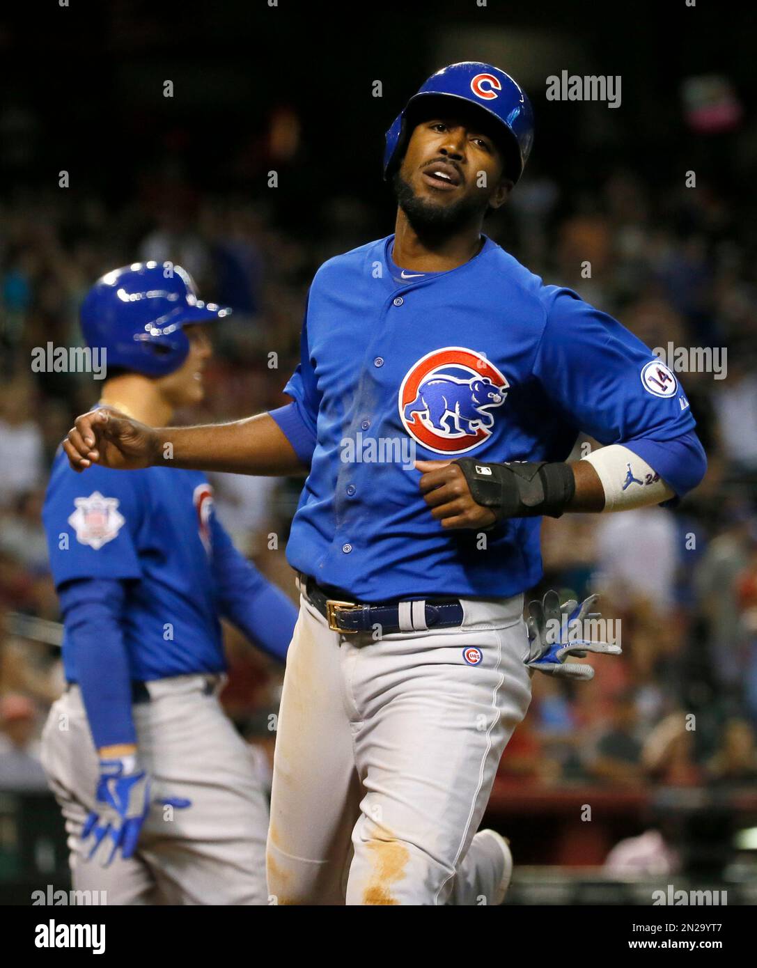 Chicago Cubs' Dexter Fowler scores on an RBI double by teammate Kris ...