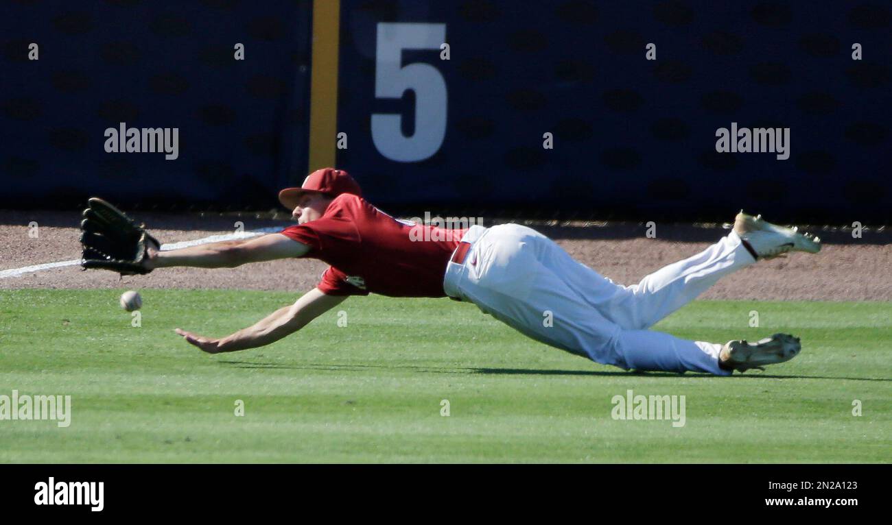 Alabama's Riley Colburn dives for the ball and misses against ...