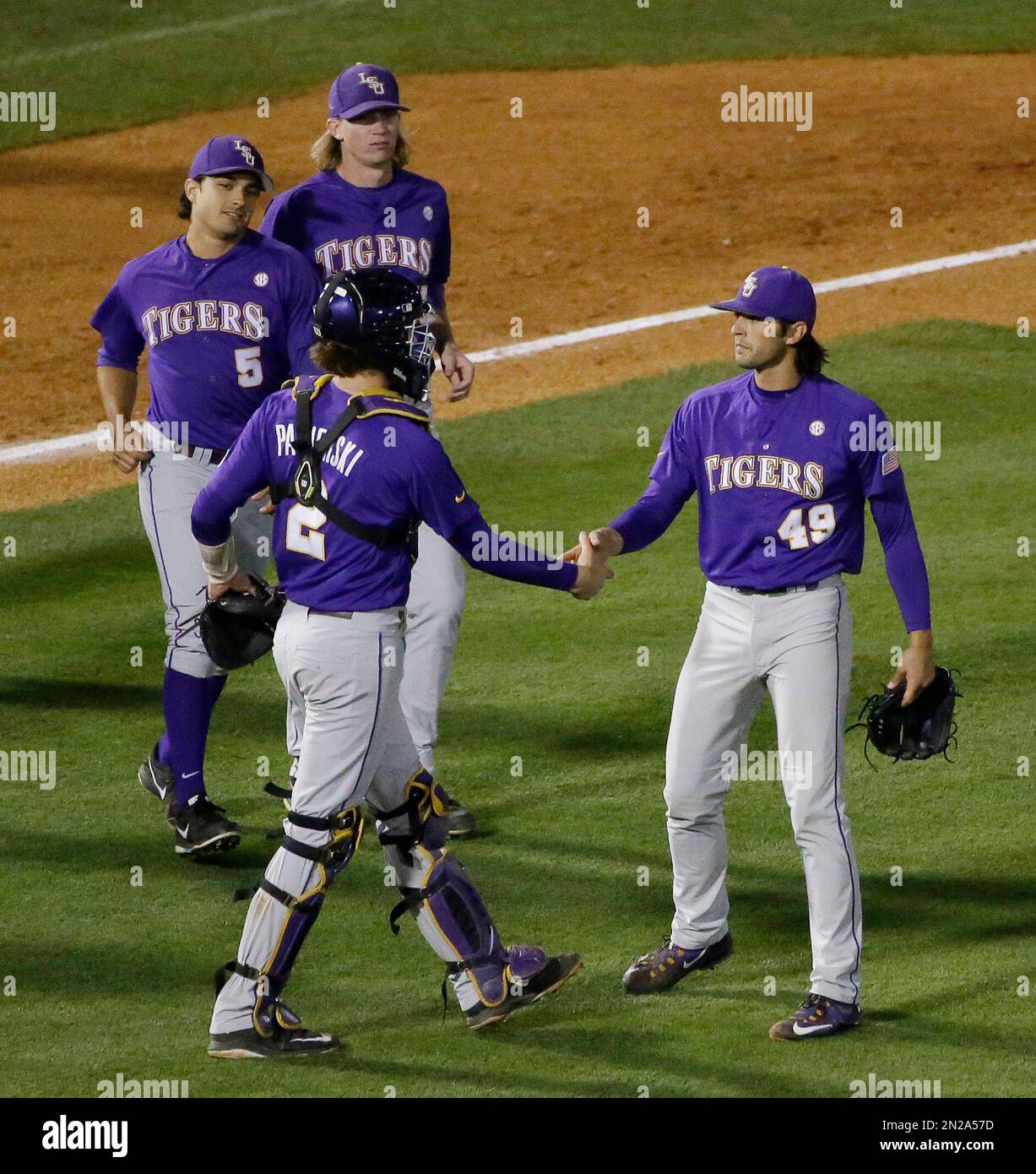 LSU pitcher Zac Person shakes hands with Michael Papierski after LSU ...