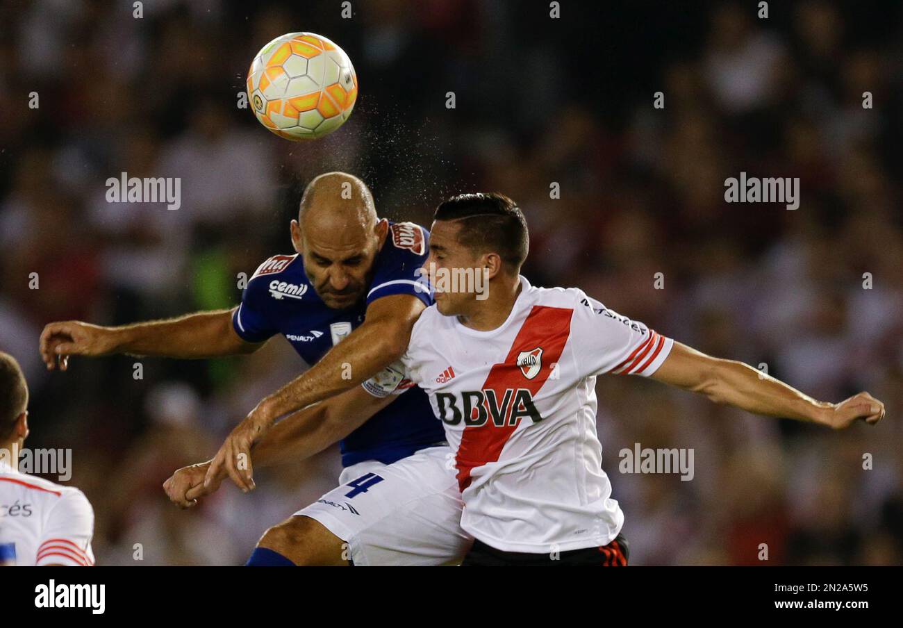 Ramiro Funes Mori of Argentina's River Plate, right, fights for the ...