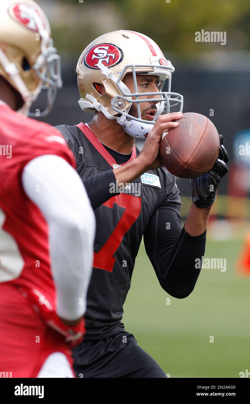 San Francisco 49ers quarterback Colin Kaepernick prepares to throw, as ...