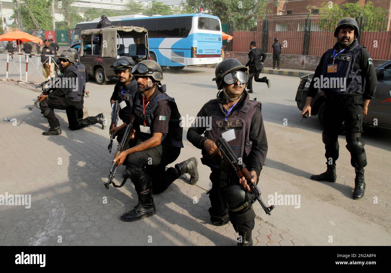 Pakistani police commandos take positions as the Zimbabwean cricket ...