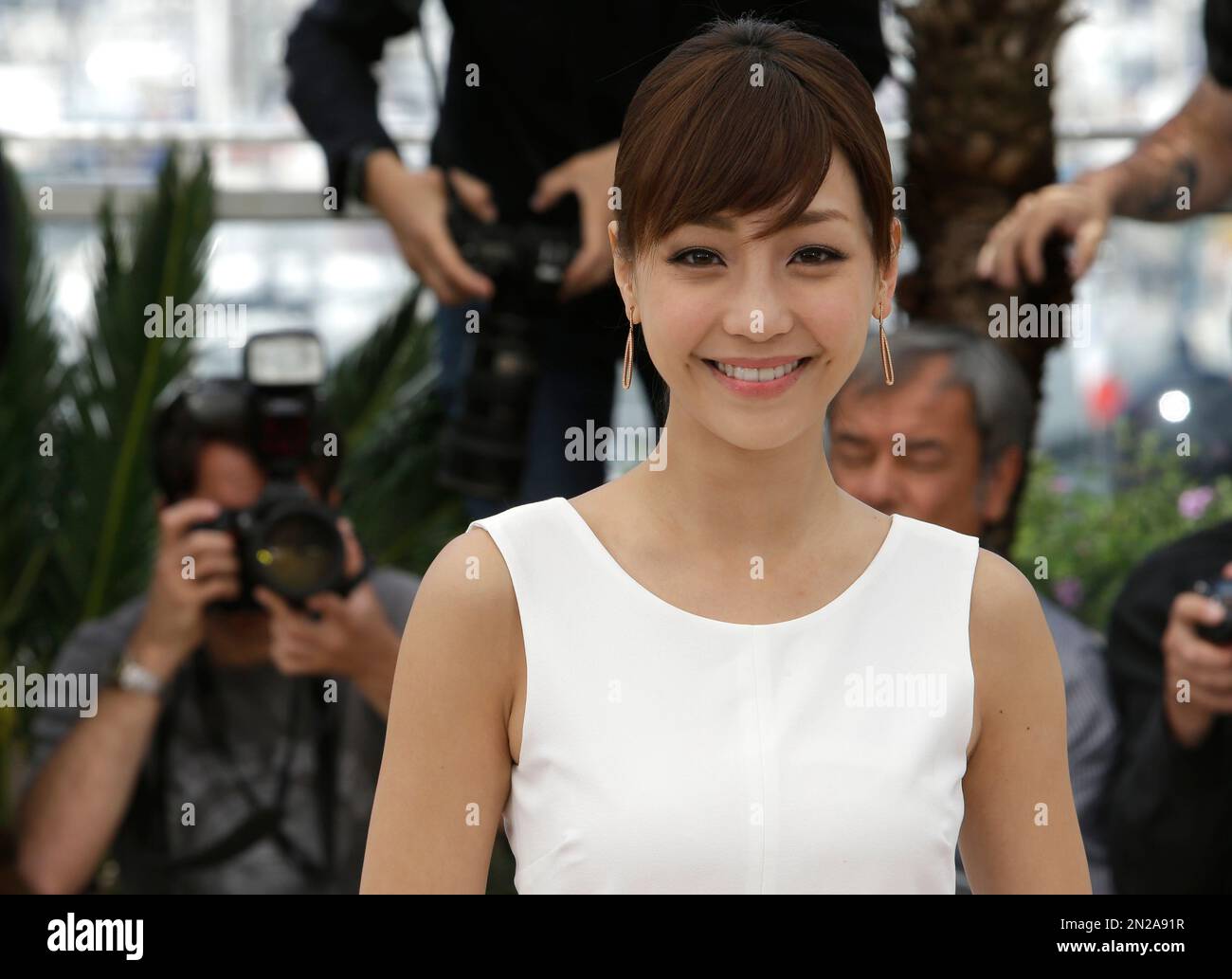 Actress Hsieh Hsin-Ying poses for photographers during a photo call for ...