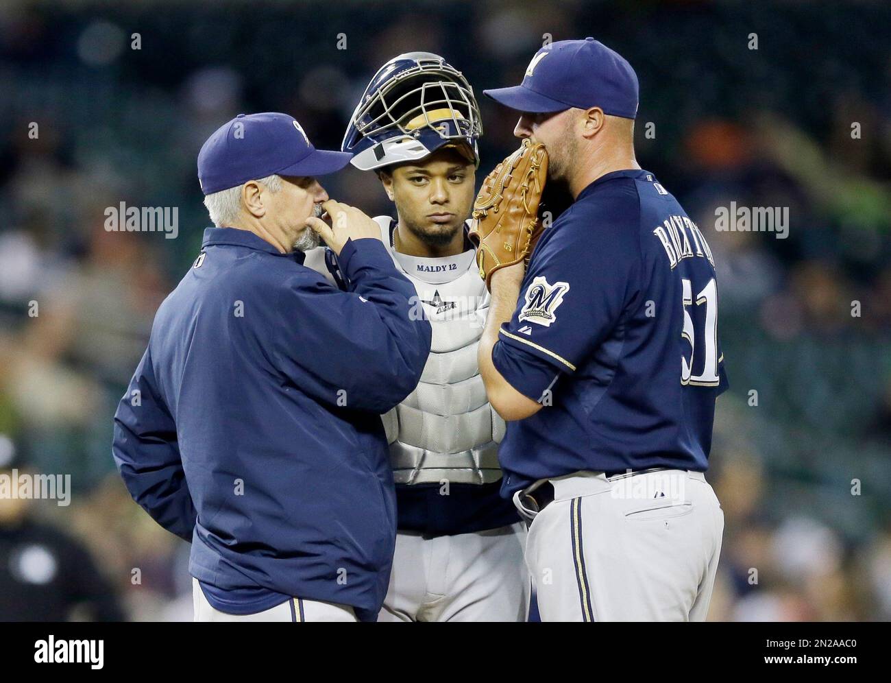Milwaukee Brewers pitching coach Rick Kranitz talks with relief pitcher ...