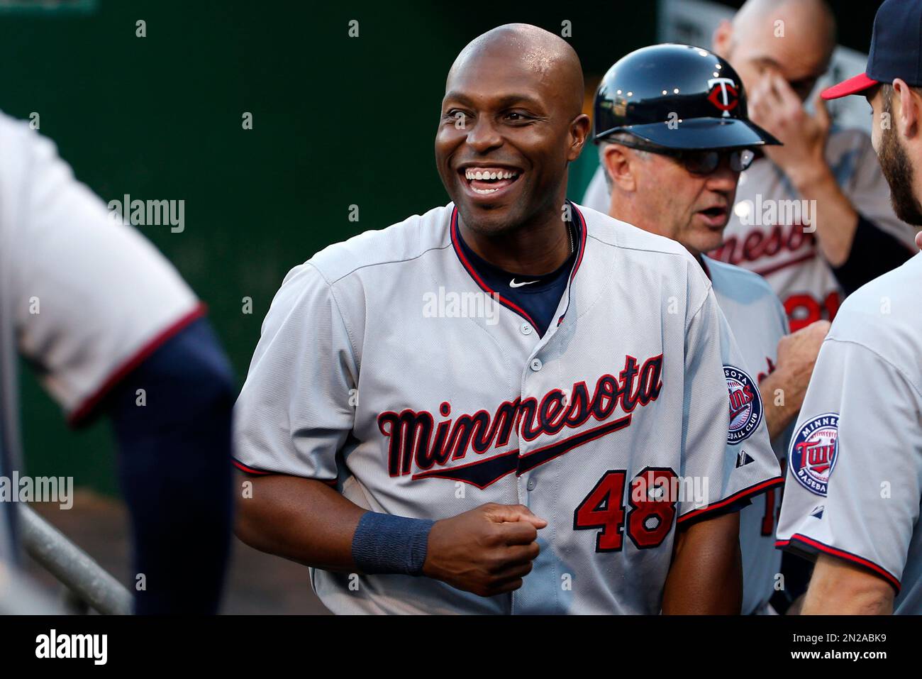 Minnesota Twins' Torii Hunter (48) walks through the dugout before a ...