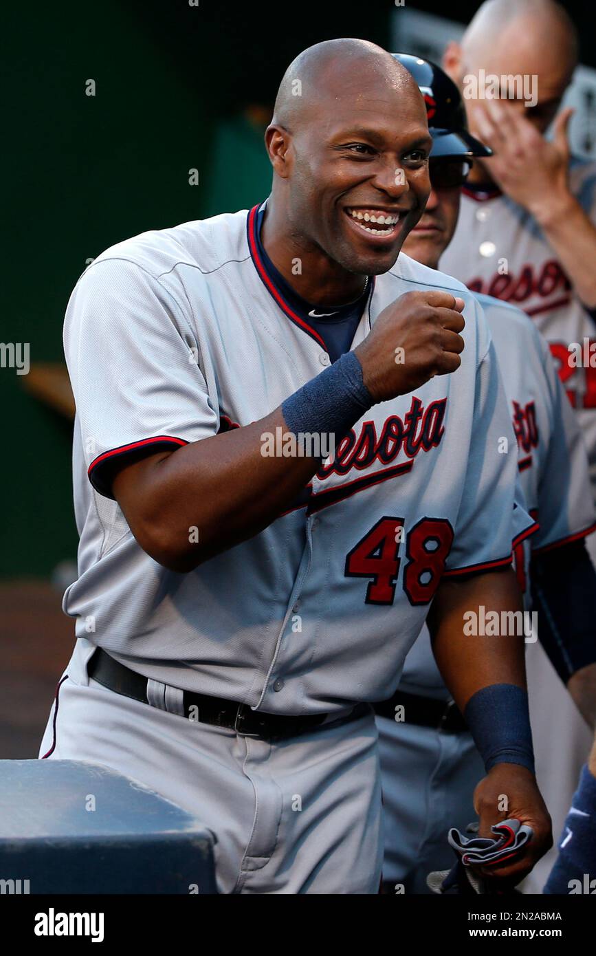 Minnesota Twins' Torii Hunter (48) walks through the dugout before a ...