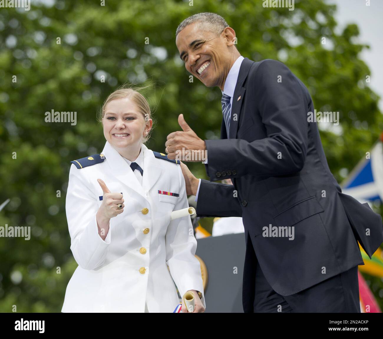 President Barack Obama and Ensign Lillian Joy Simon give a 'thumbs-up ...