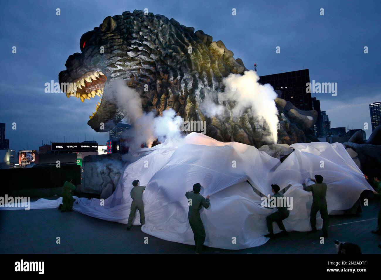 FILE - In this April 9, 2015 file photo, Godzilla's head is unveiled ...
