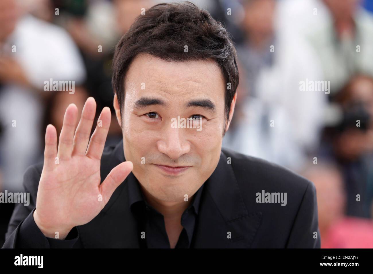 Actor Bae Sung-woo poses for photographers during a photo call for the ...