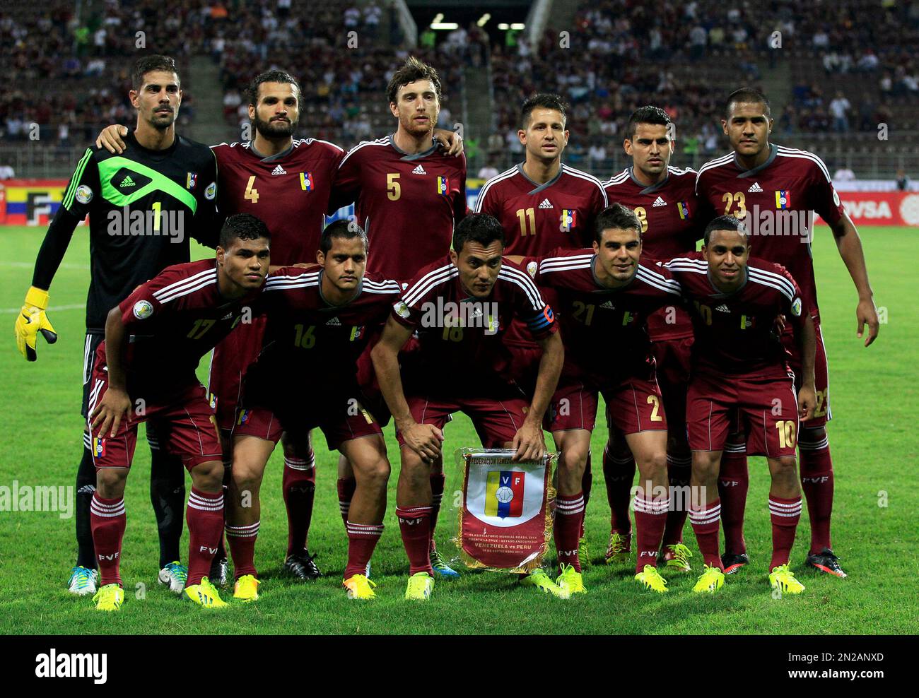 In this photo taken Sept. 10, 203, Venezuela national soccer team pose ...