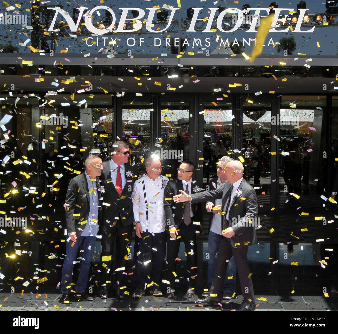 Confetti falls on, from right, Trevor Horwell, CEO of Nobu Hospitality ...