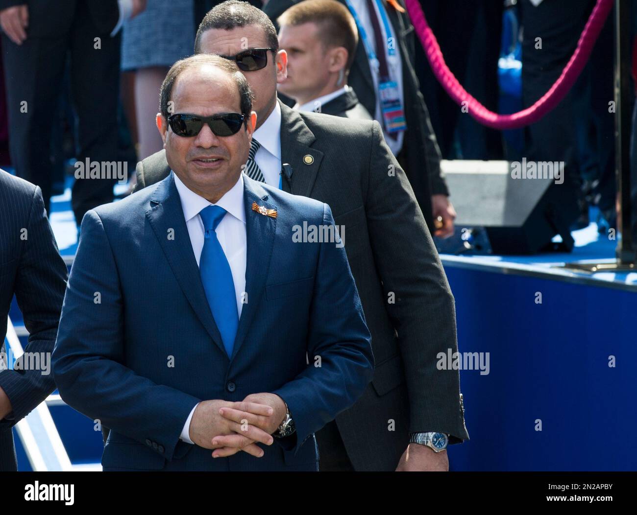Egyptian President Abdel-Fattah el-Sissi, foreground, walks leaving Red ...