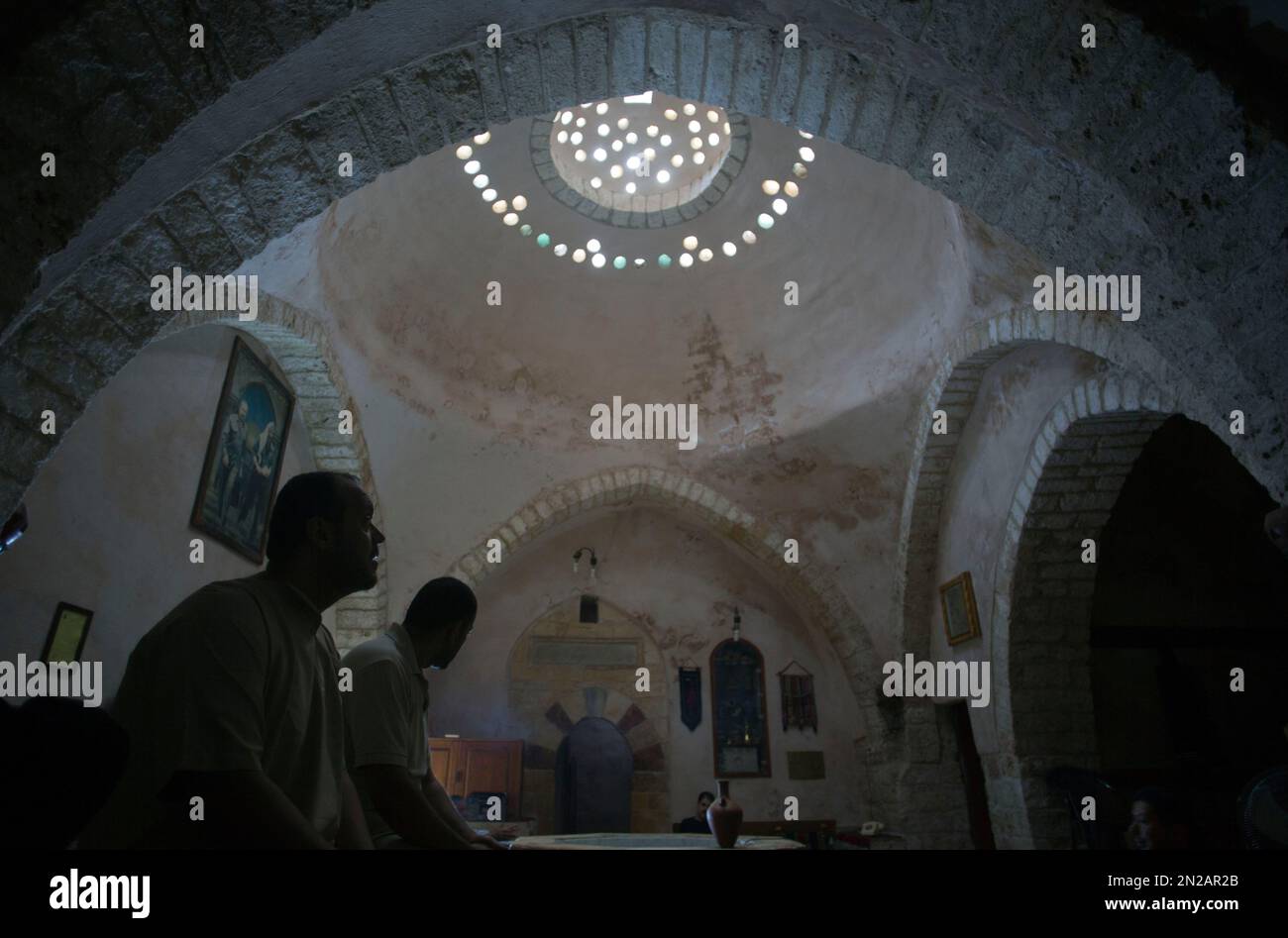 In this Saturday, May 9, 2015, photo, Palestinians sit to relax after ...