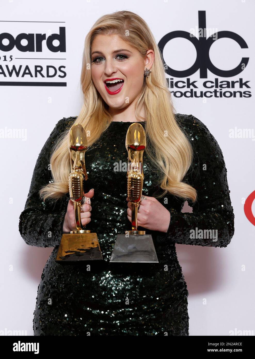 Meghan Trainor poses in the press room with the awards for top hot 100 ...