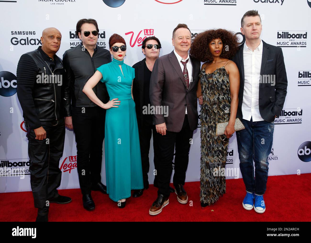 The musical group Simple Minds, from left, Mel Gaynor, Andrew Gillespie ...