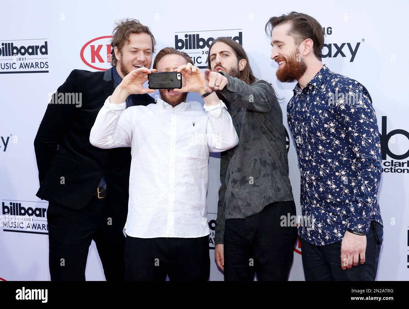 Dan Reynolds, from left, Ben McKee, Daniel Sermon, and Daniel Platzman ...