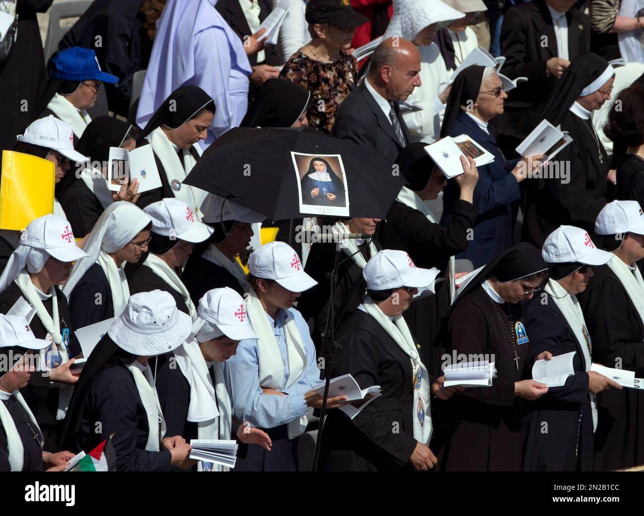 Nuns attend a canonization ceremony of four new saints led by Pope ...