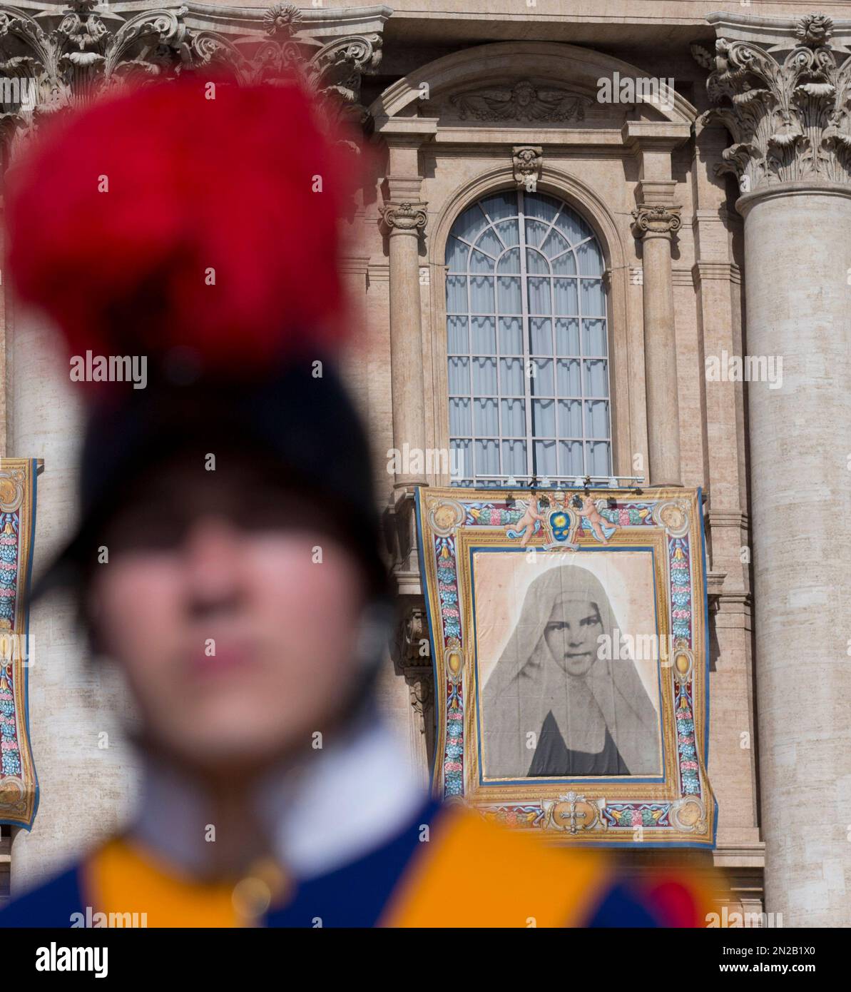 The tapestry of St. Mariam Bawardy hangs from a balcony in St. Peter's ...