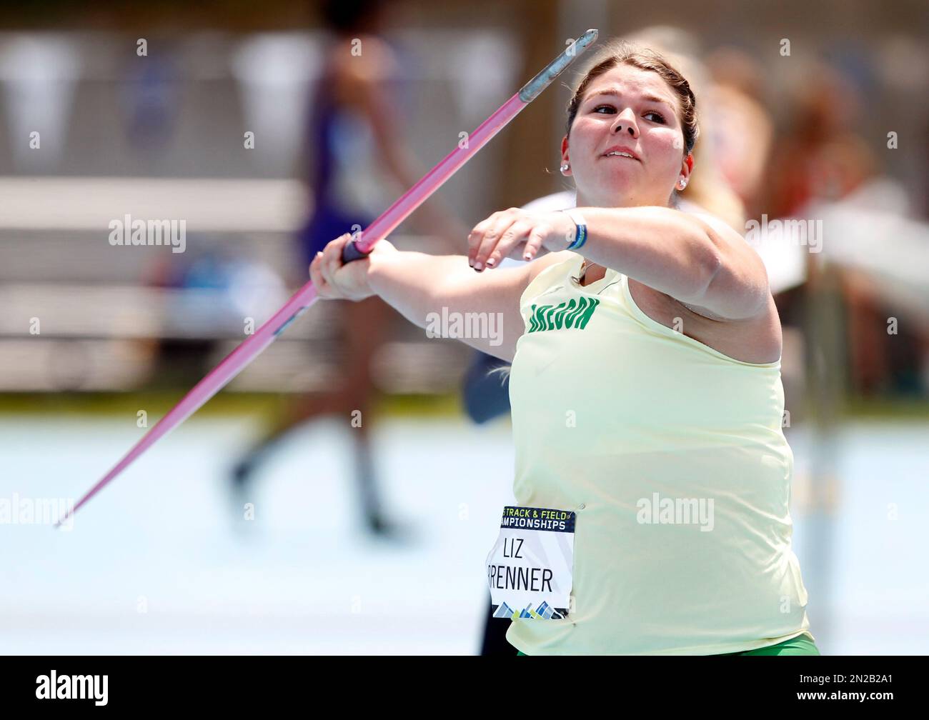 Oregon's Liz Brenner throws the javelin to place third during the event ...