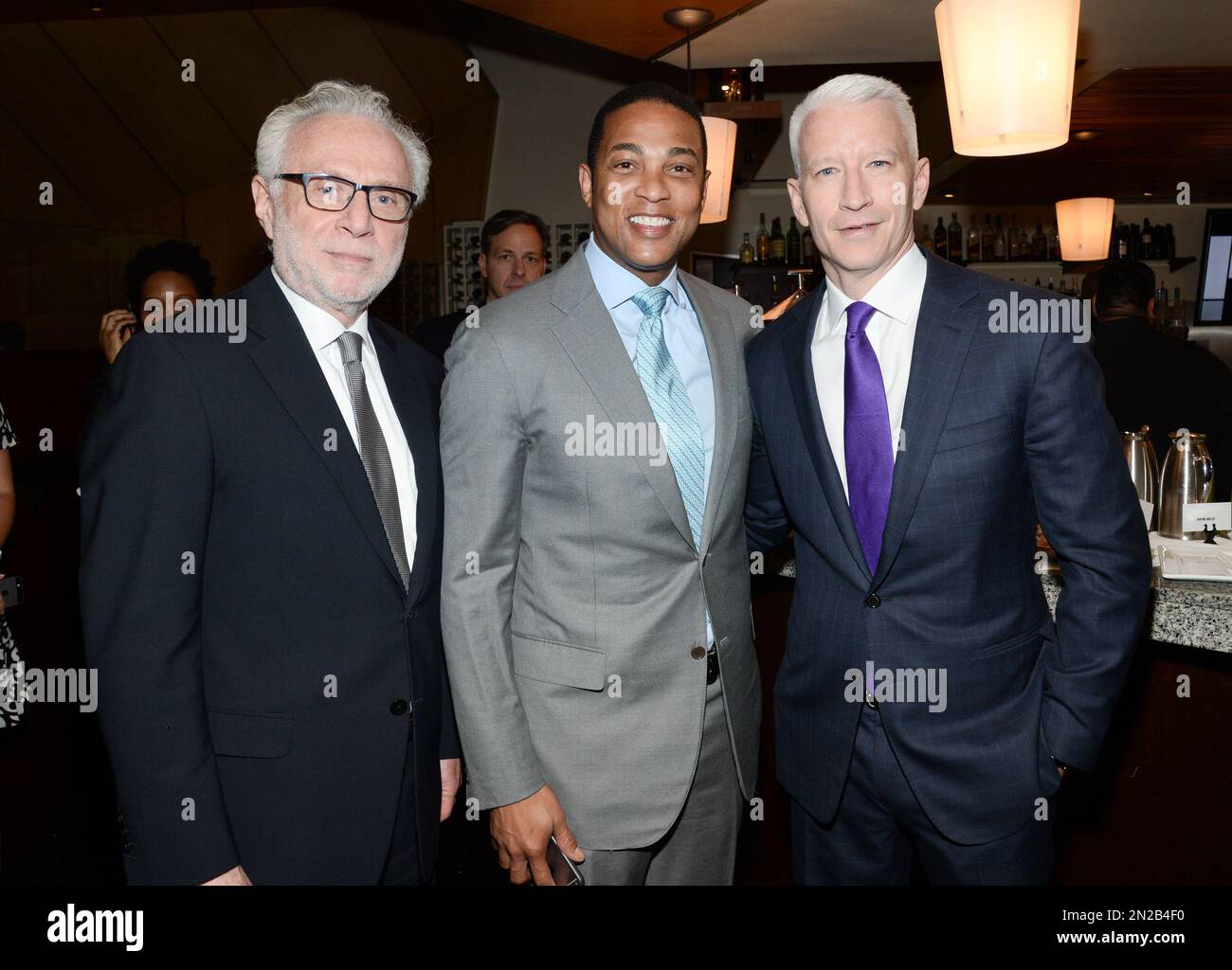 CNN news anchors Wolf Blitzer, left, Don Lemon and Anderson Cooper ...
