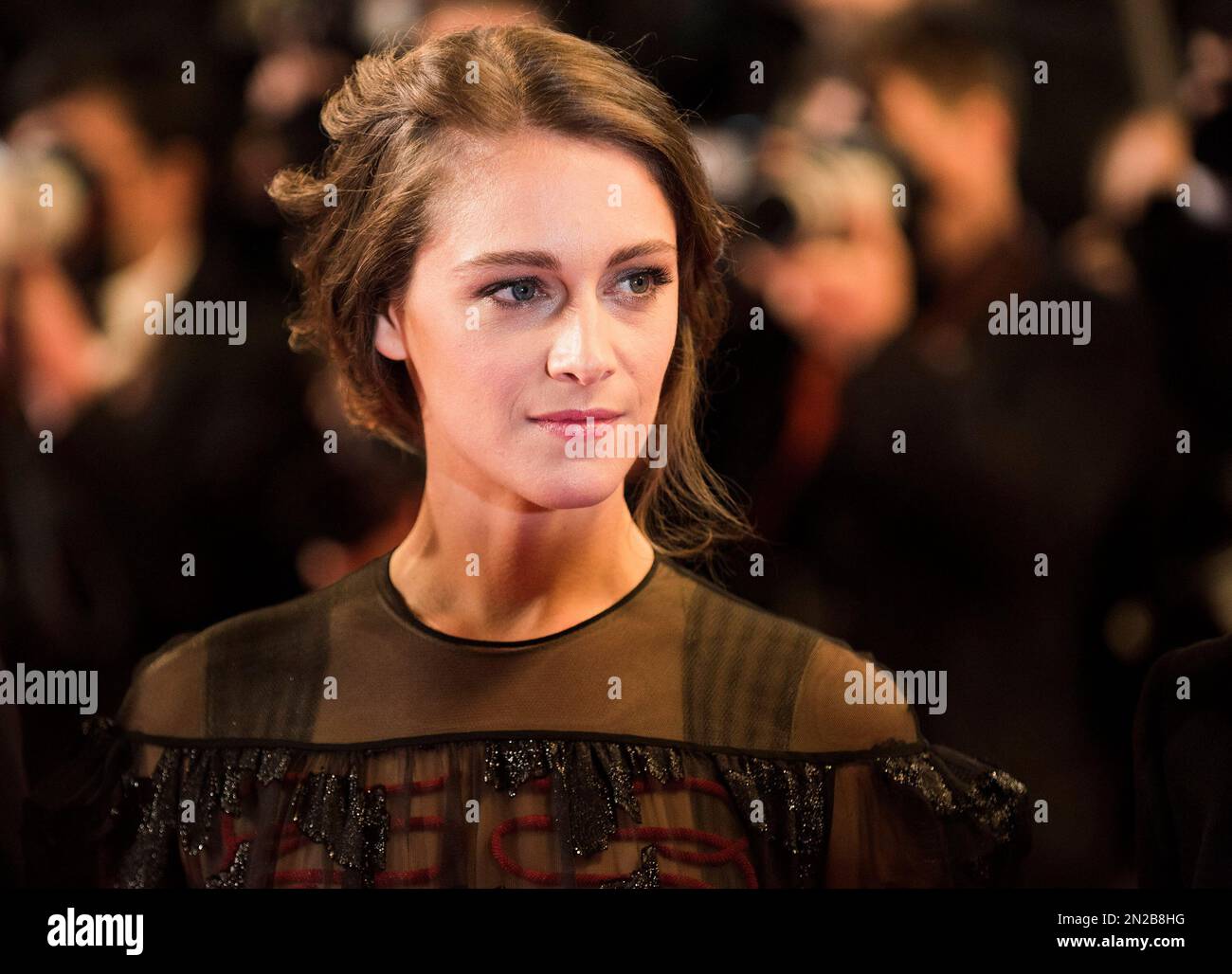 Ariane Labed poses for photographers on the red carpet at the screening ...