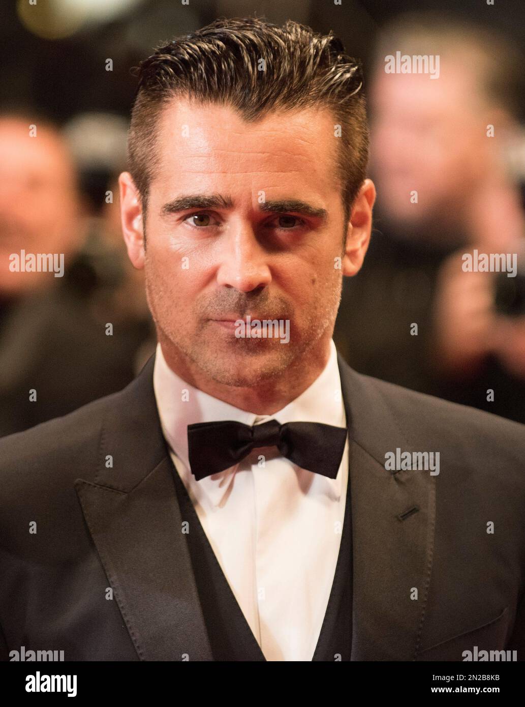 Colin Farrell poses for photographers on the red carpet at the ...
