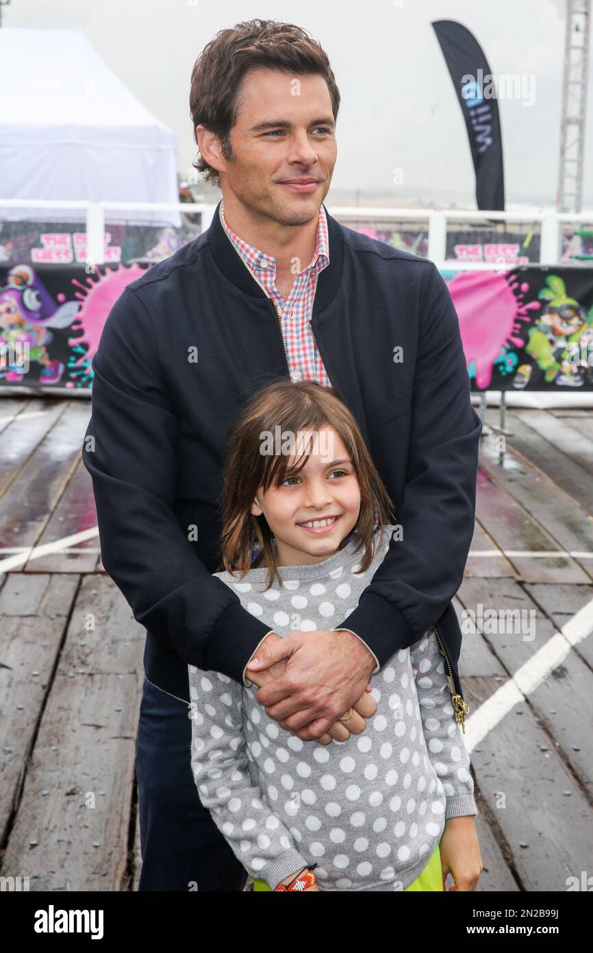 James Marsden, top, and daughter Mary James Marsden arrive at the Nintendo Splatoon Event at the ...