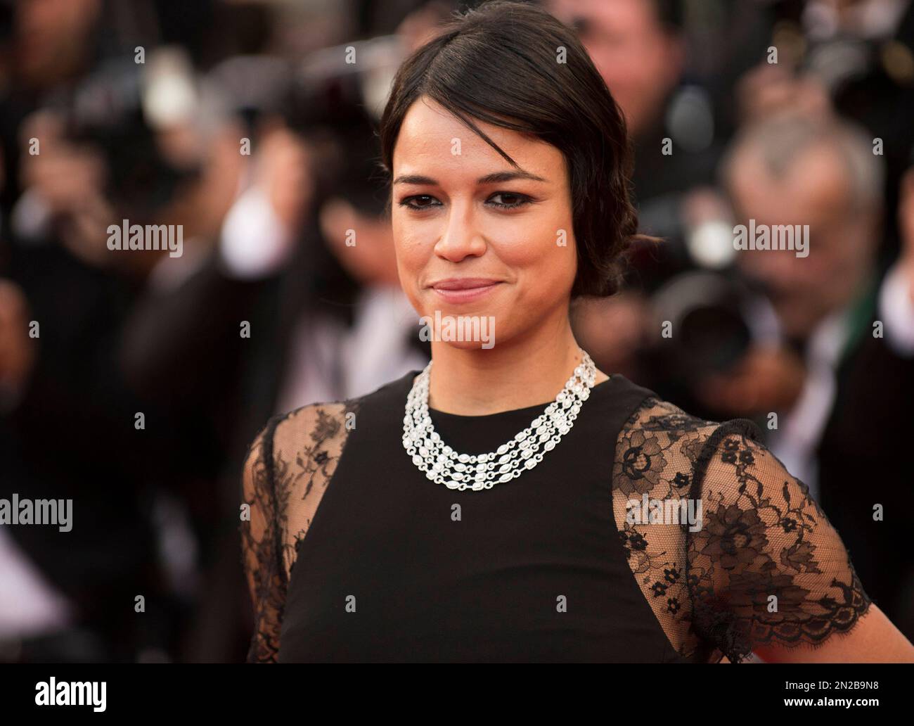 Actress Michelle Rodriguez poses for photographers on the red carpet at ...