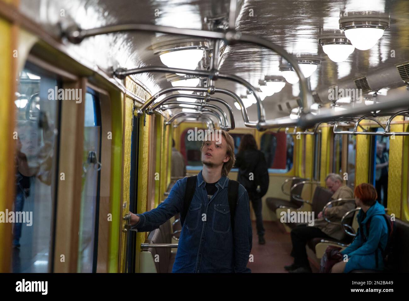 People walk in a Soviet-era vintage subway car, parked in the ...