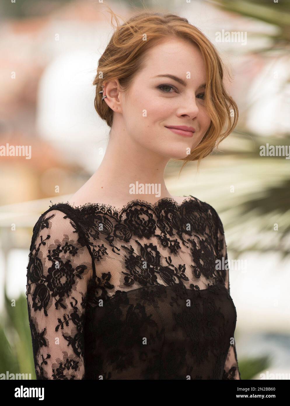 Actress Emma Stone poses for photographers during a photo call for the ...