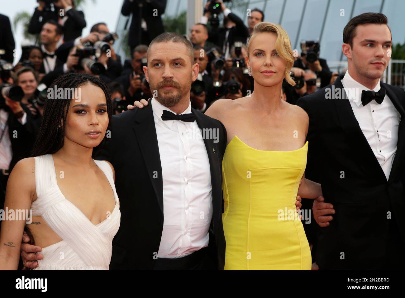 From left, actors Zoe Kravitz, Tom Hardy, Charlize Theron, and Nicholas ...