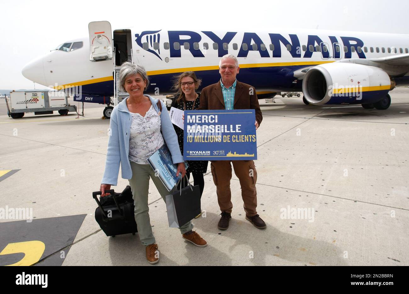 Passenger Peter Goldstein, right, who lives in London, with his wife ...