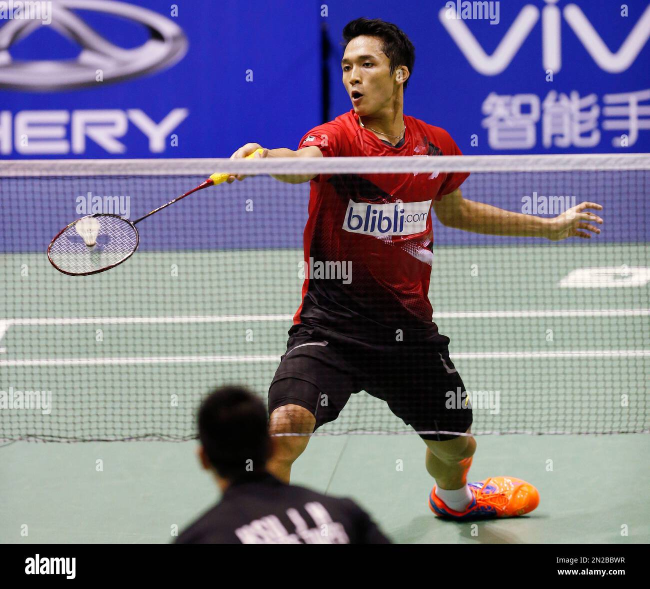 Indonesia's Christie Jonatan makes a forehand return to Taiwan's Hsu ...