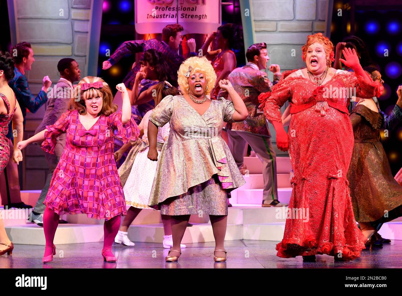 (L-R) Carmel Rodrigues, in the character of Tracy Turnblad, Asabi ...