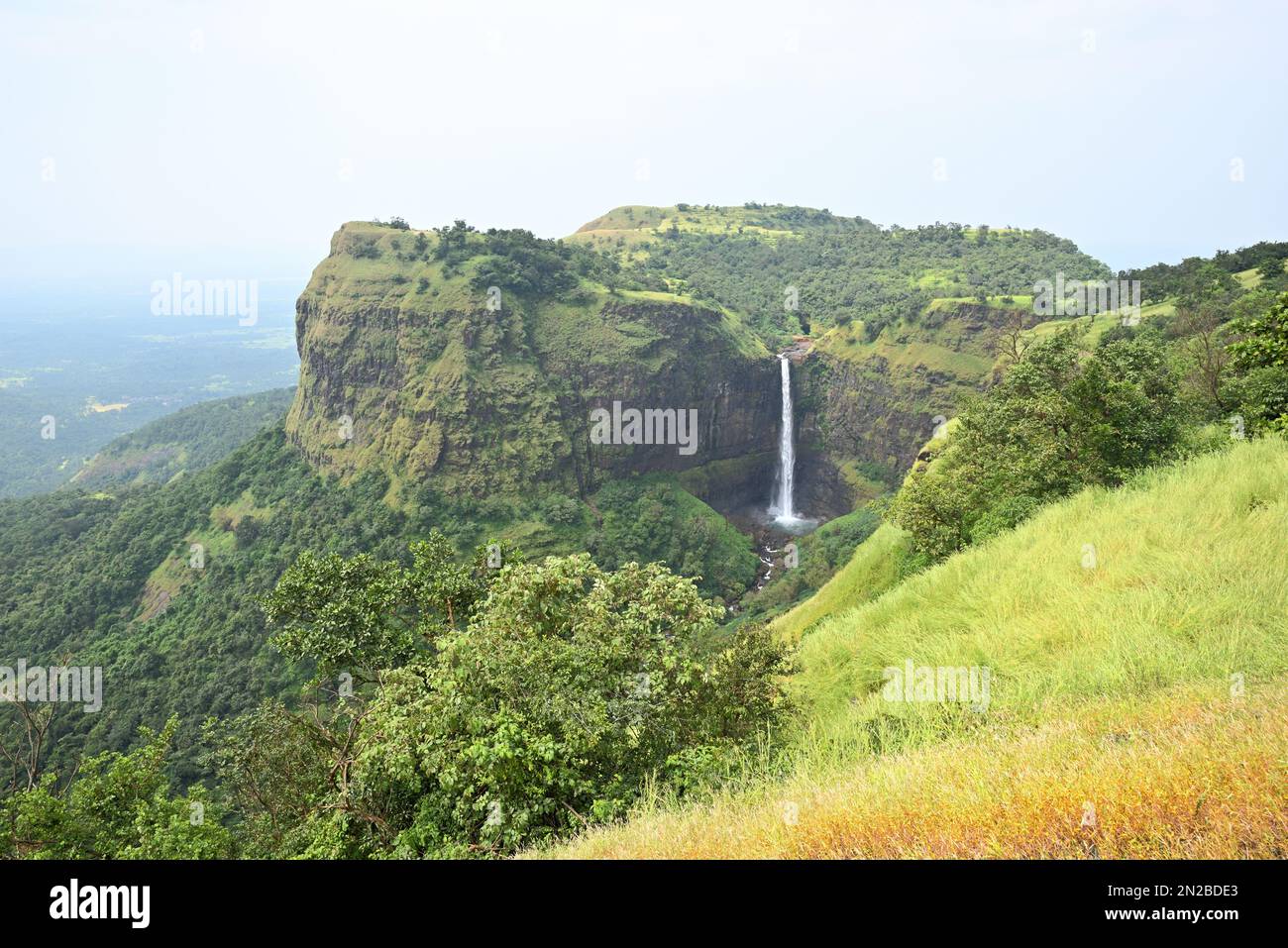 Kumbhe waterfall in monsoon season. Waterfall flowing through mountains ...
