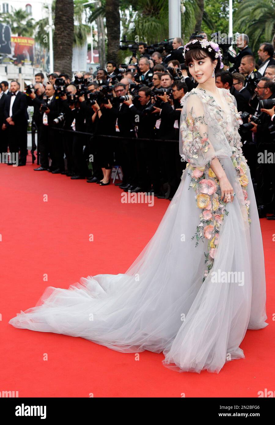 Actress Fan Bing Bing poses for photographers as she arrives for the ...