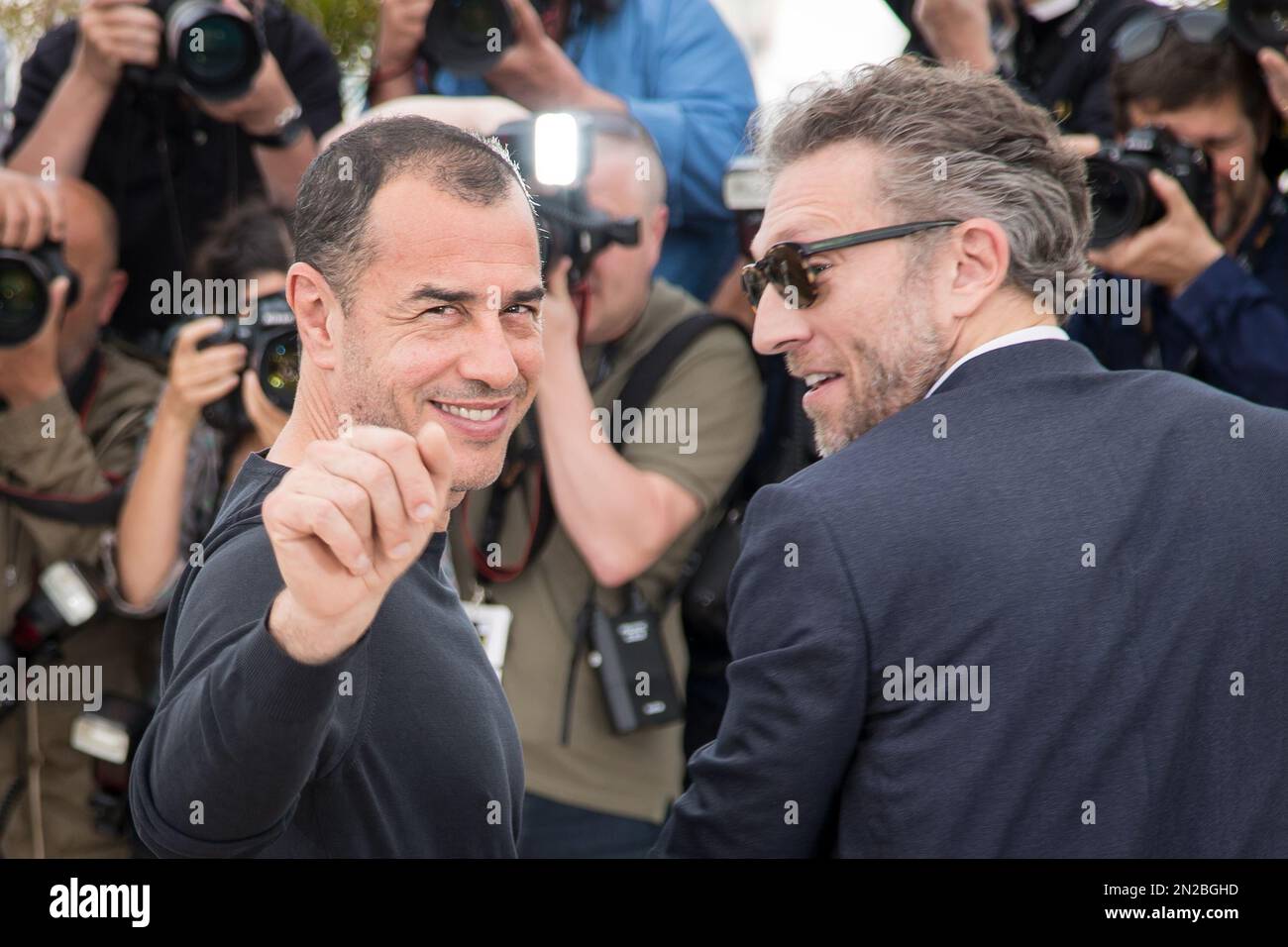 Director Matteo Garrone and Vincent Cassel pose for photographers ...